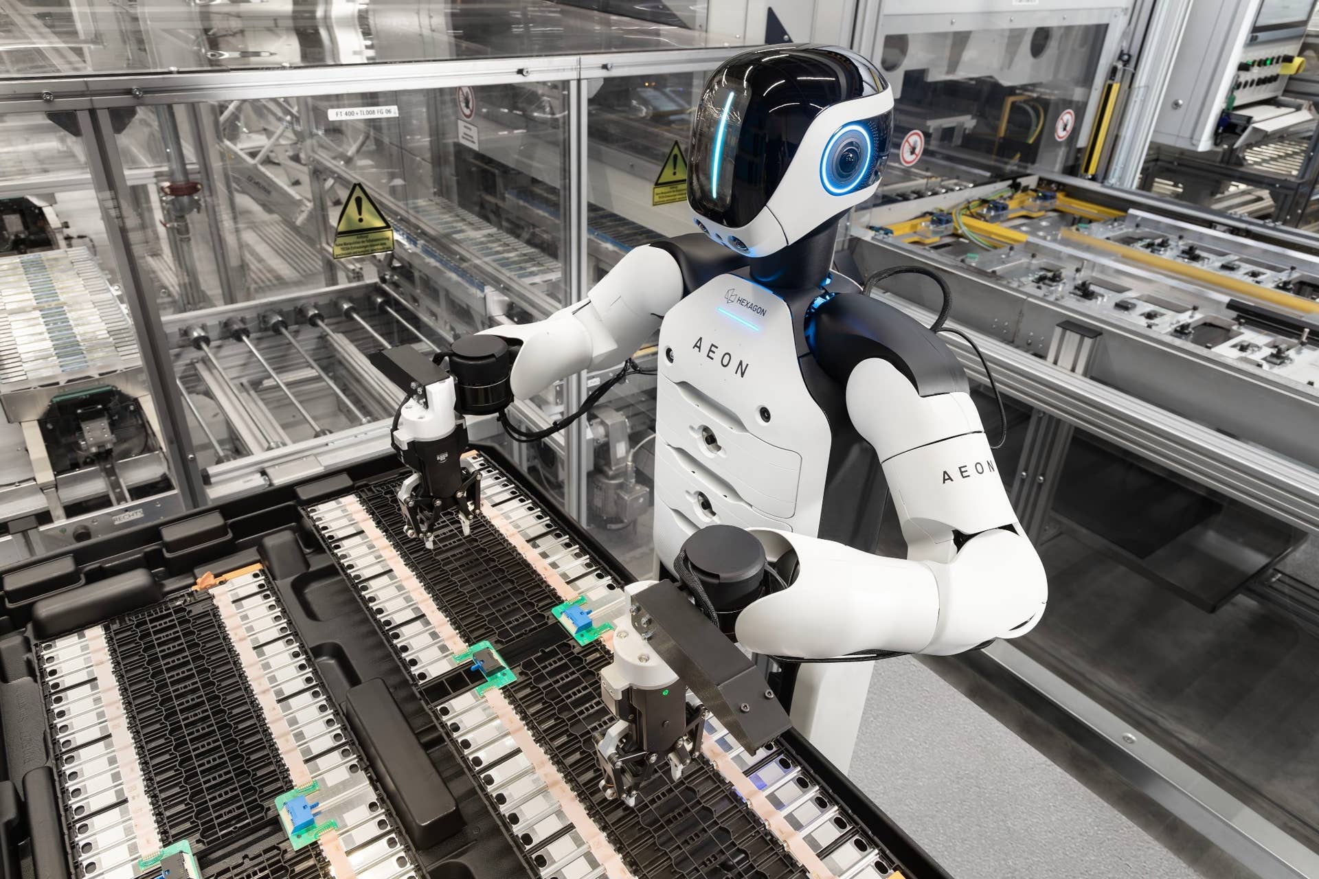 BMW Is Putting Humanoid Robots on Its Factory Floor to Cut EV Costs ...