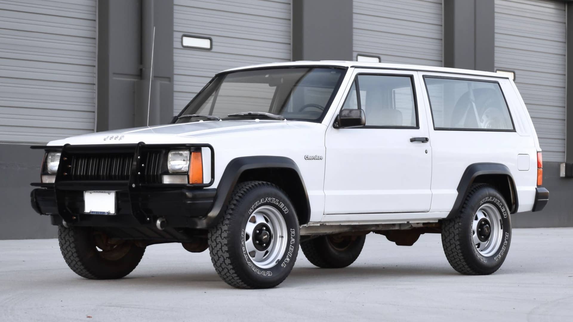 This '93 Jeep Cherokee has two doors, five speeds and a whole lot of ...