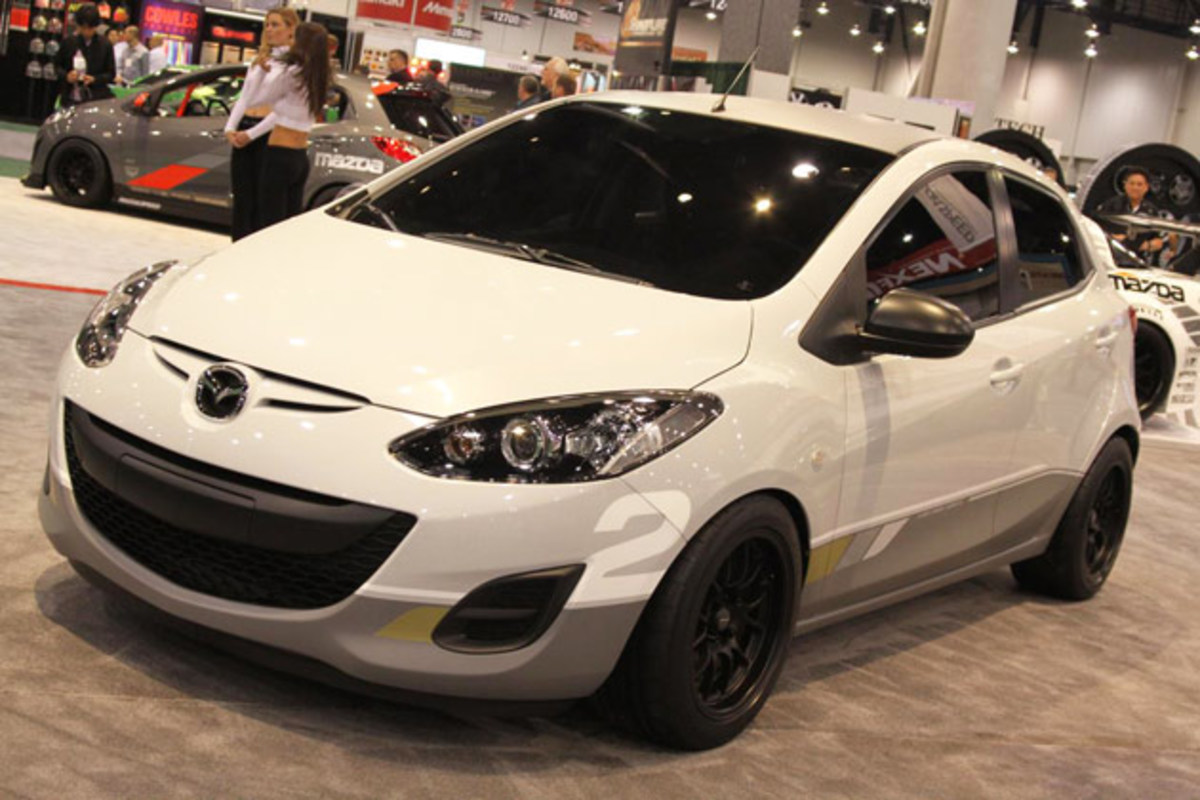 SEMA 2010: Puma-hip Mazda2 and its Evil Track twin elicit our want ...