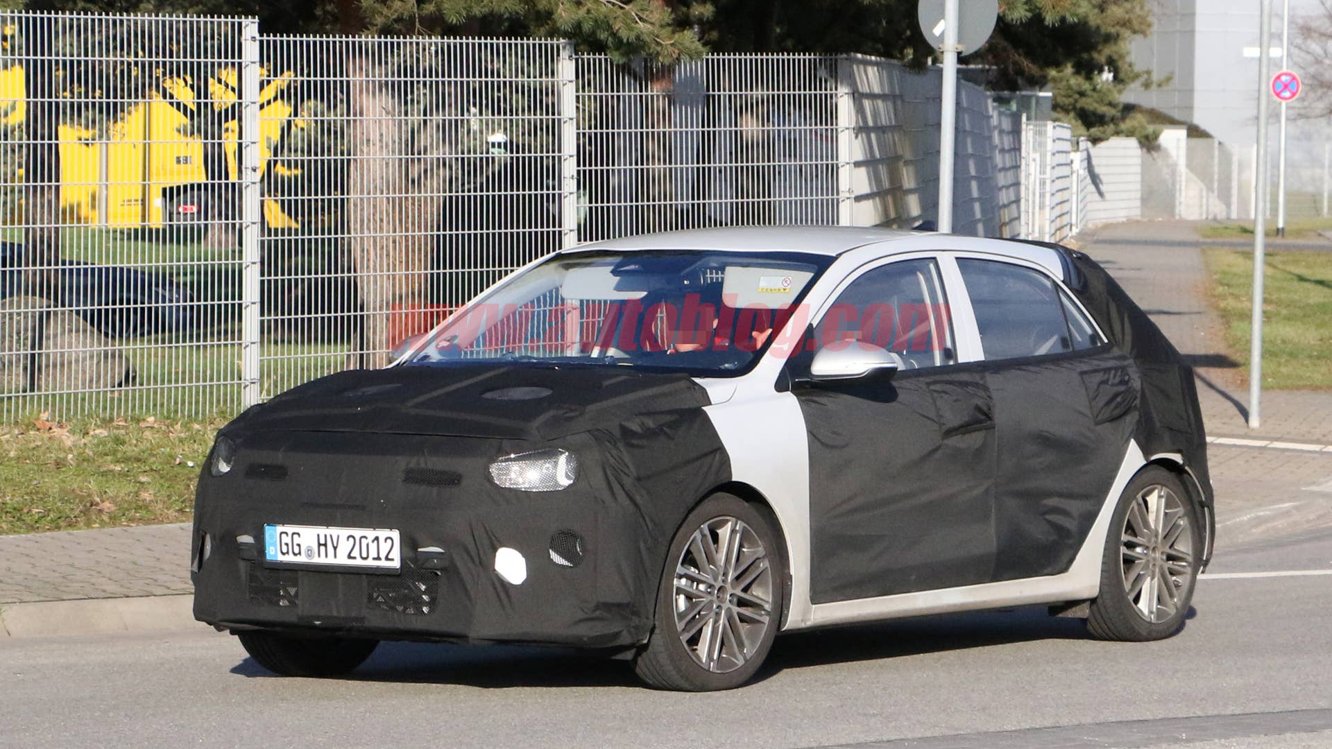 2021 Kia Rio spied with heavy camo, wearing a mid-cycle refresh ...