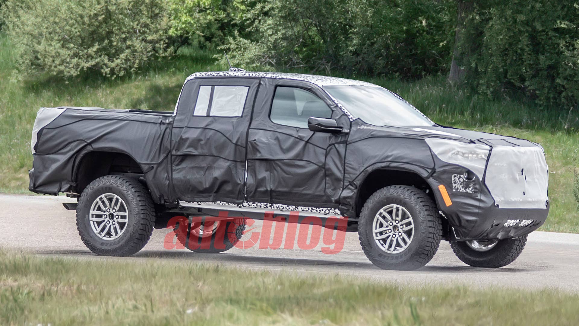 2023 GMC Canyon with ZR2-style off-road suspension caught in spy photos ...