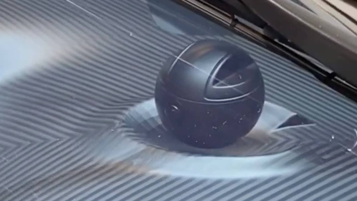The Koenigsegg Gemera has a floating, spinning camera on its dashboard ...