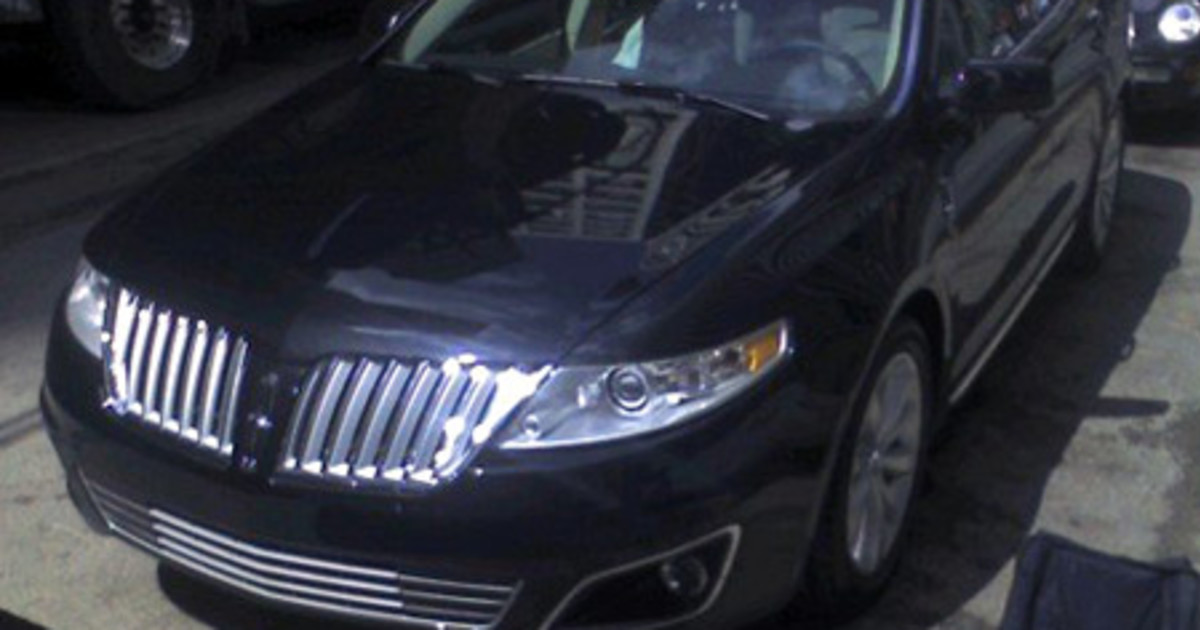 Spy Shots: Lincoln MKS in the buff on the set of Batman - Autoblog