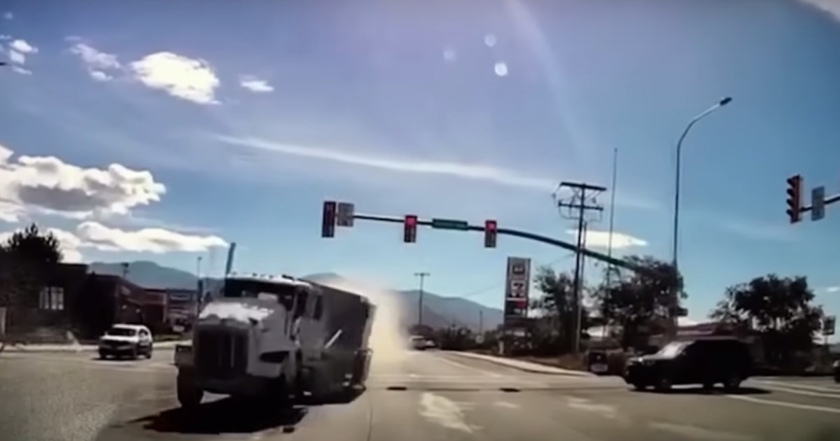Runaway double-bottom semi takes out 33 cars as it barrels into ...