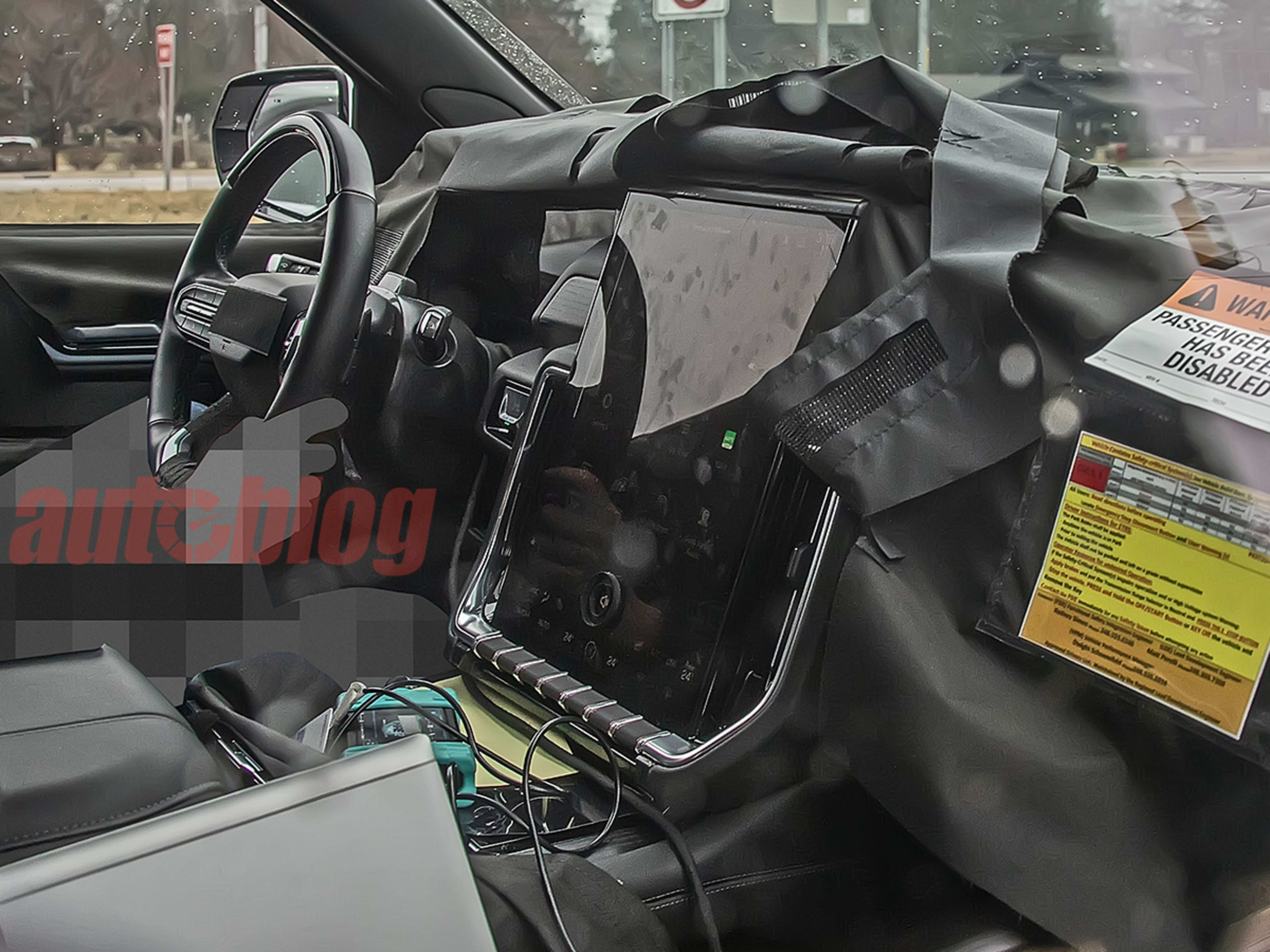 GMC Yukon spy shots show refresh with Acadia-style interior - Autoblog