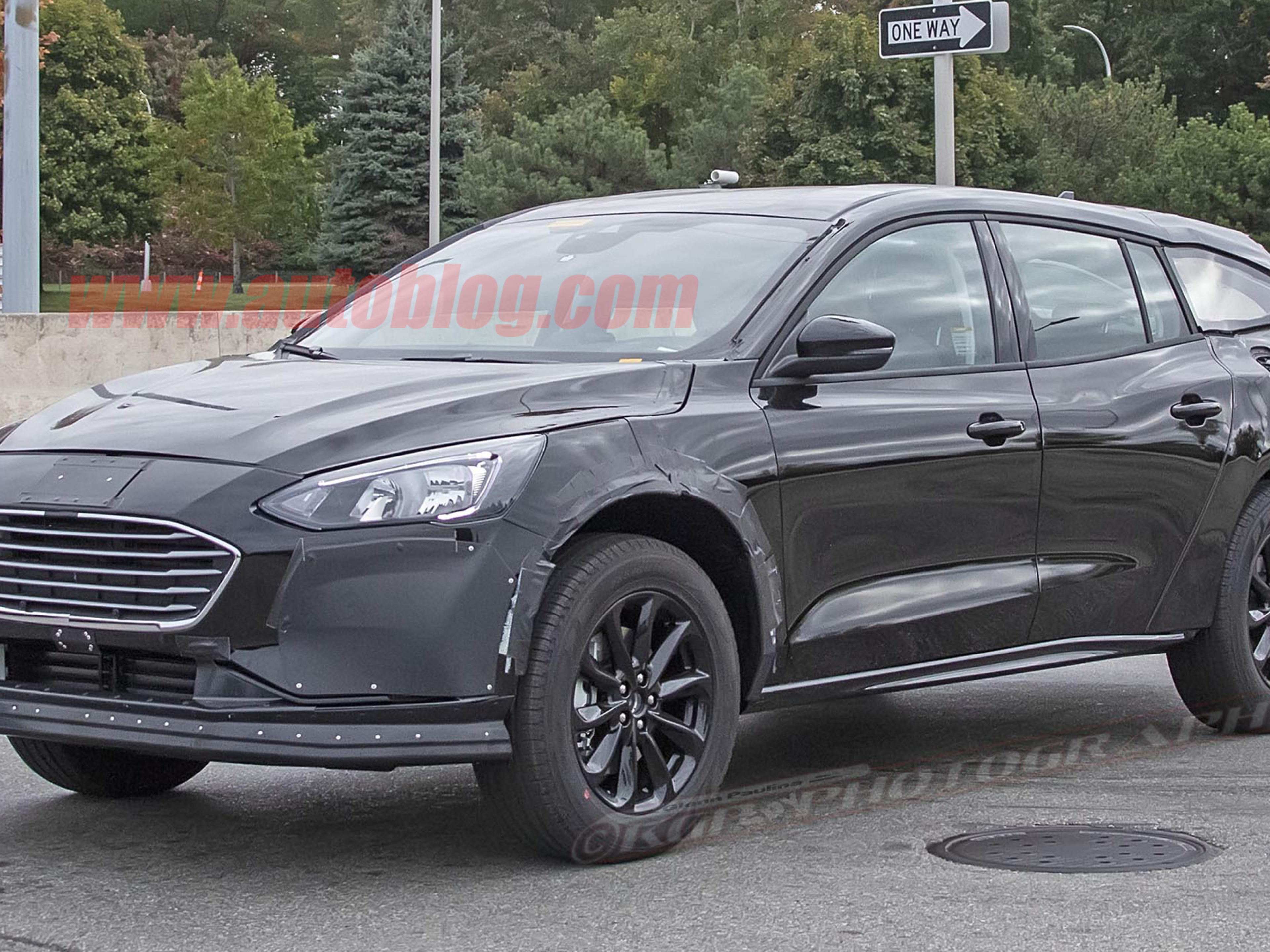 Ford Fusion-size crossover spied with lifted wagon looks - Autoblog
