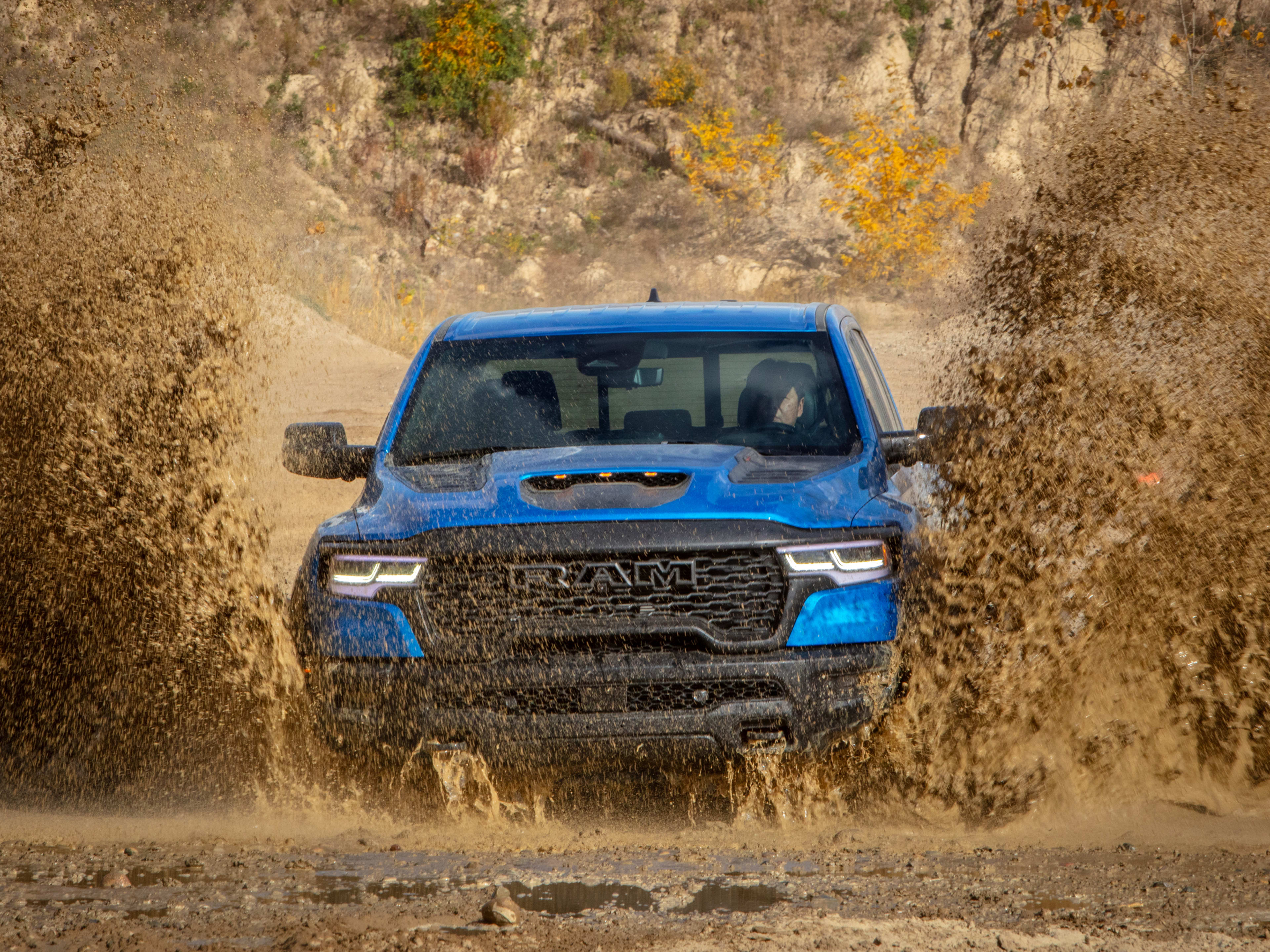 Ford F-150 Raptor vs Ram 1500 RHO: Super Truck Shootout - Autoblog