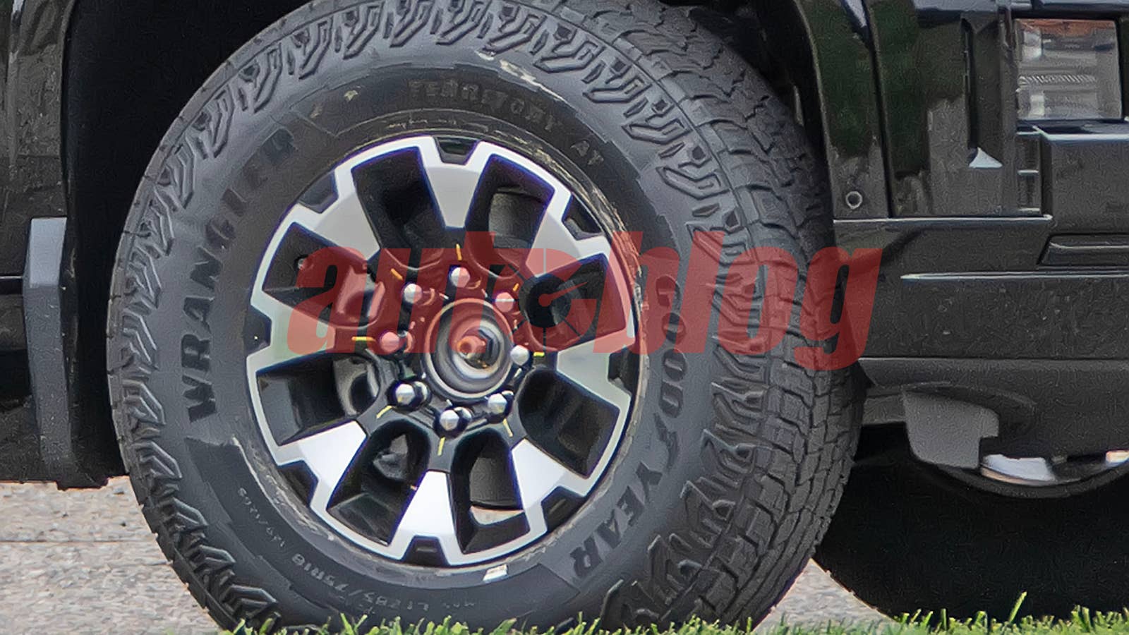 GMC Sierra EV AT4, Chevy Silverado EV Trail Boss caught in spy photos ...