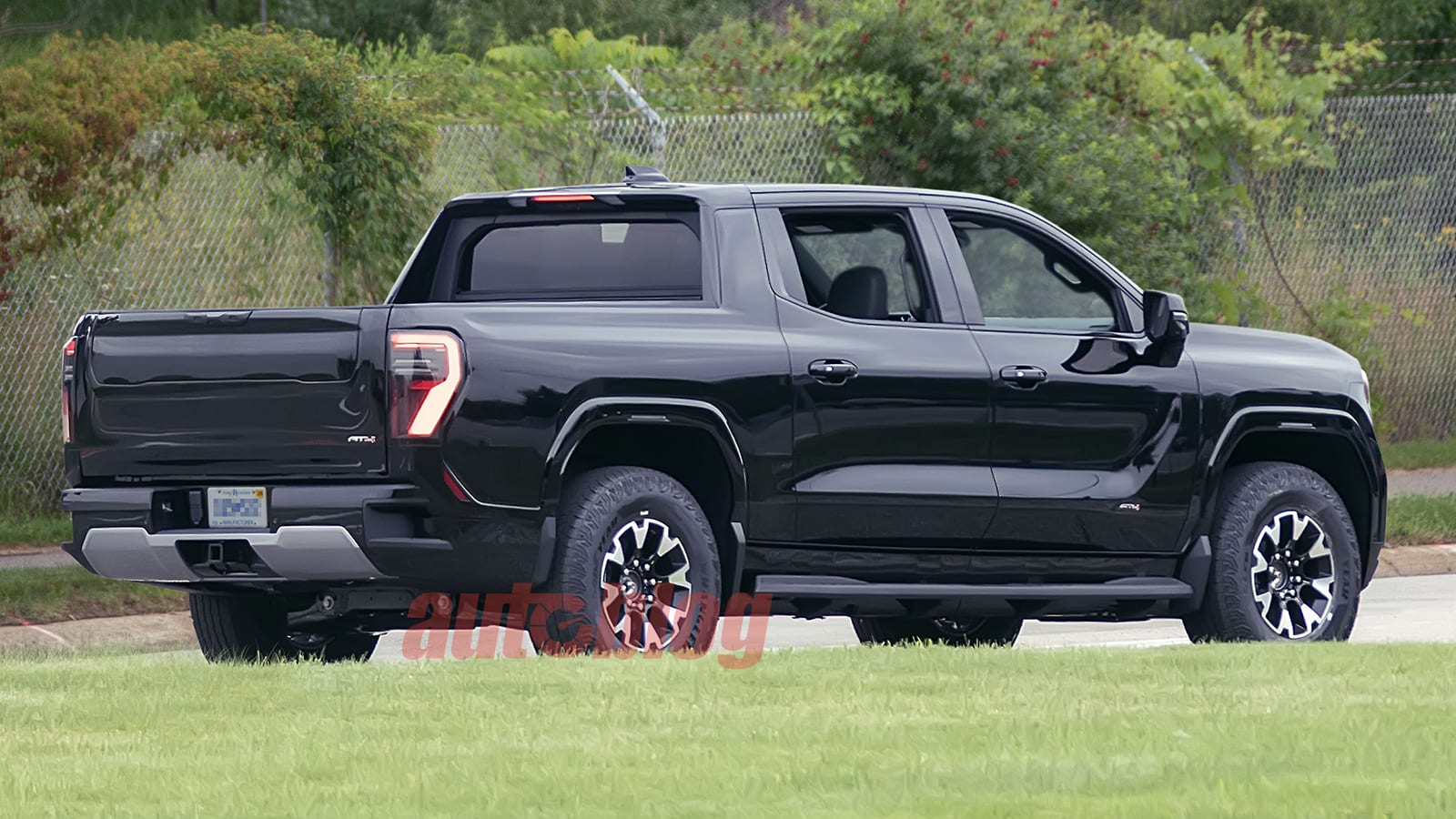 GMC Sierra EV AT4, Chevy Silverado EV Trail Boss caught in spy photos ...