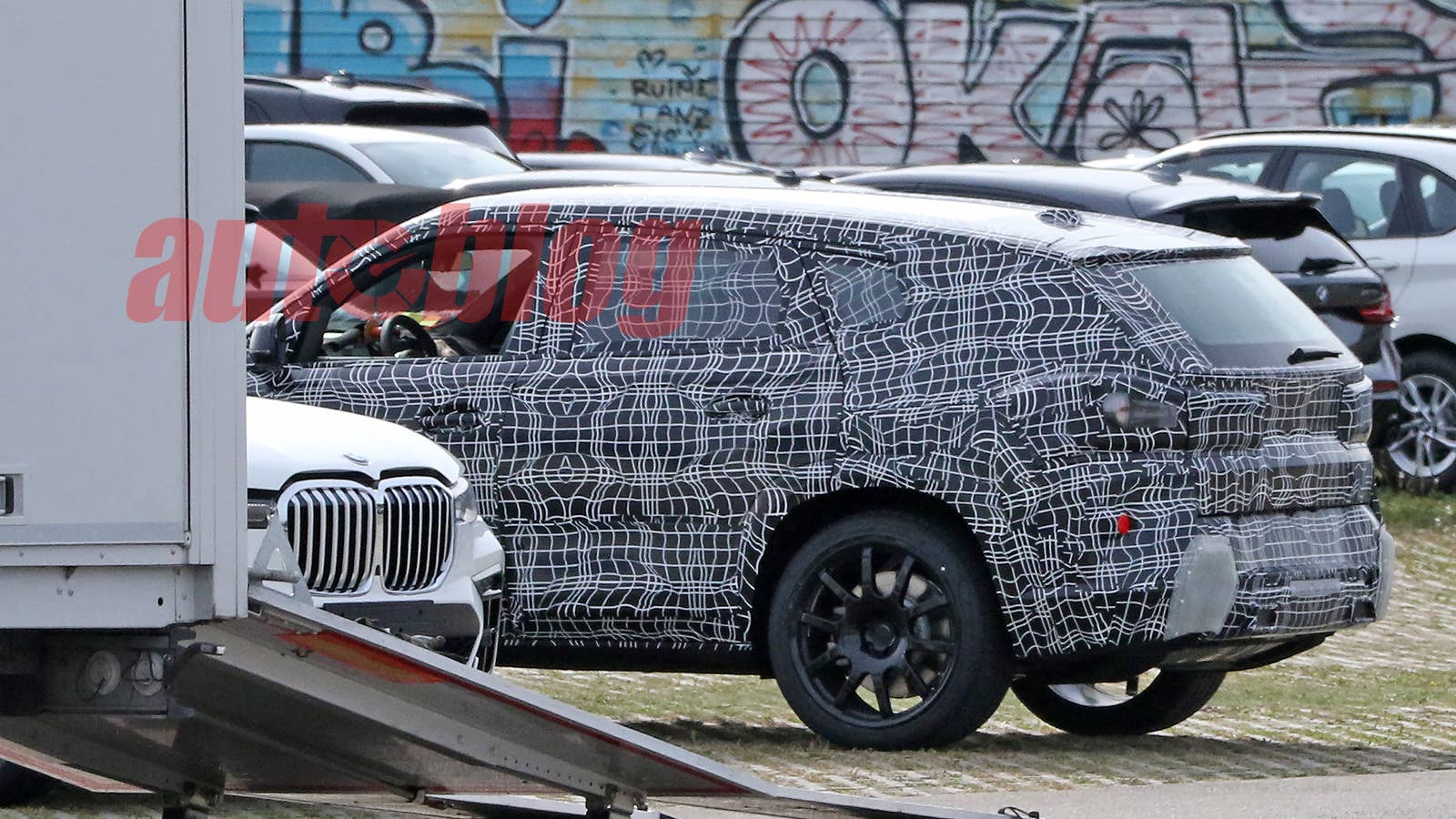 BMW X8 spy photos reveal a low roof, traditional hatchback - Autoblog