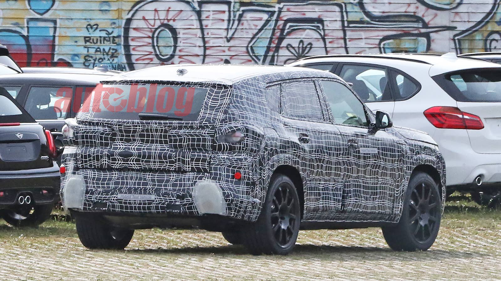 BMW X8 spy photos reveal a low roof, traditional hatchback - Autoblog