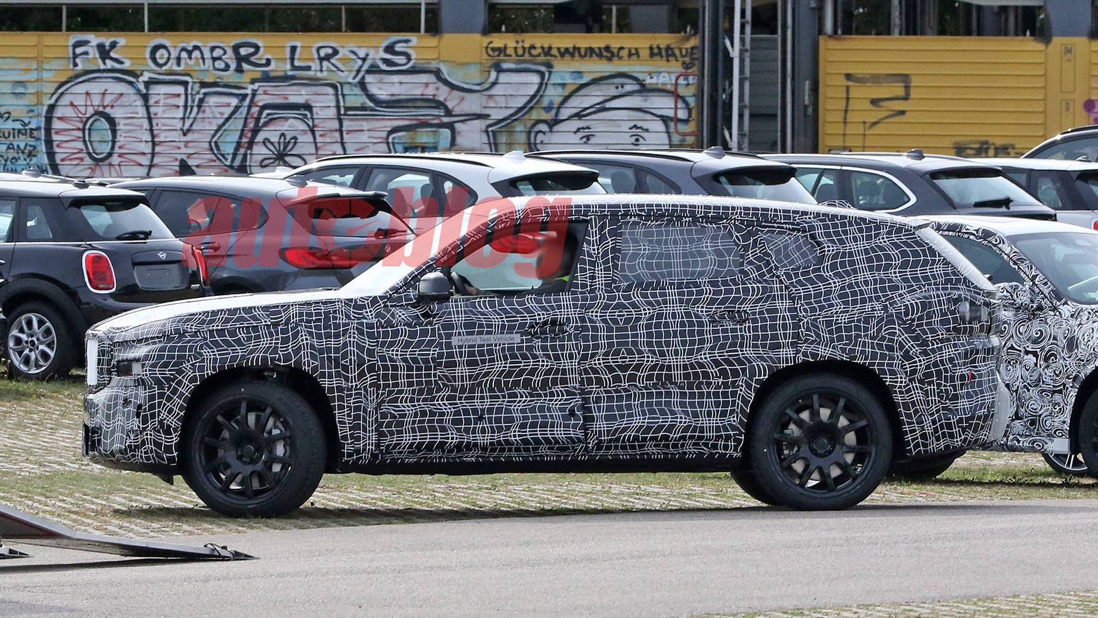 BMW X8 spy photos reveal a low roof, traditional hatchback - Autoblog