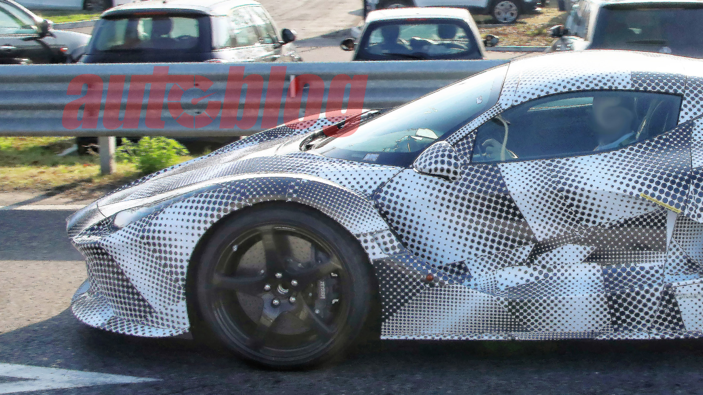 Spy photos reveal mystery Ferrari prototype