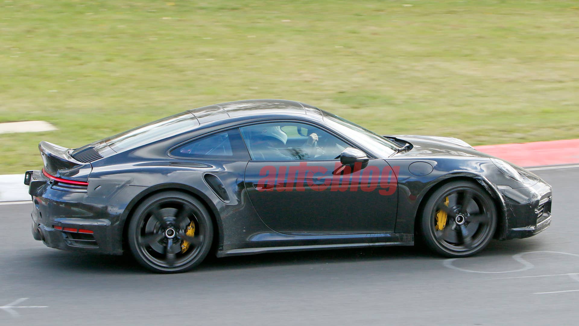 Spy photos show Porsche 911 Turbo ducktail prototype at the 'ring ...