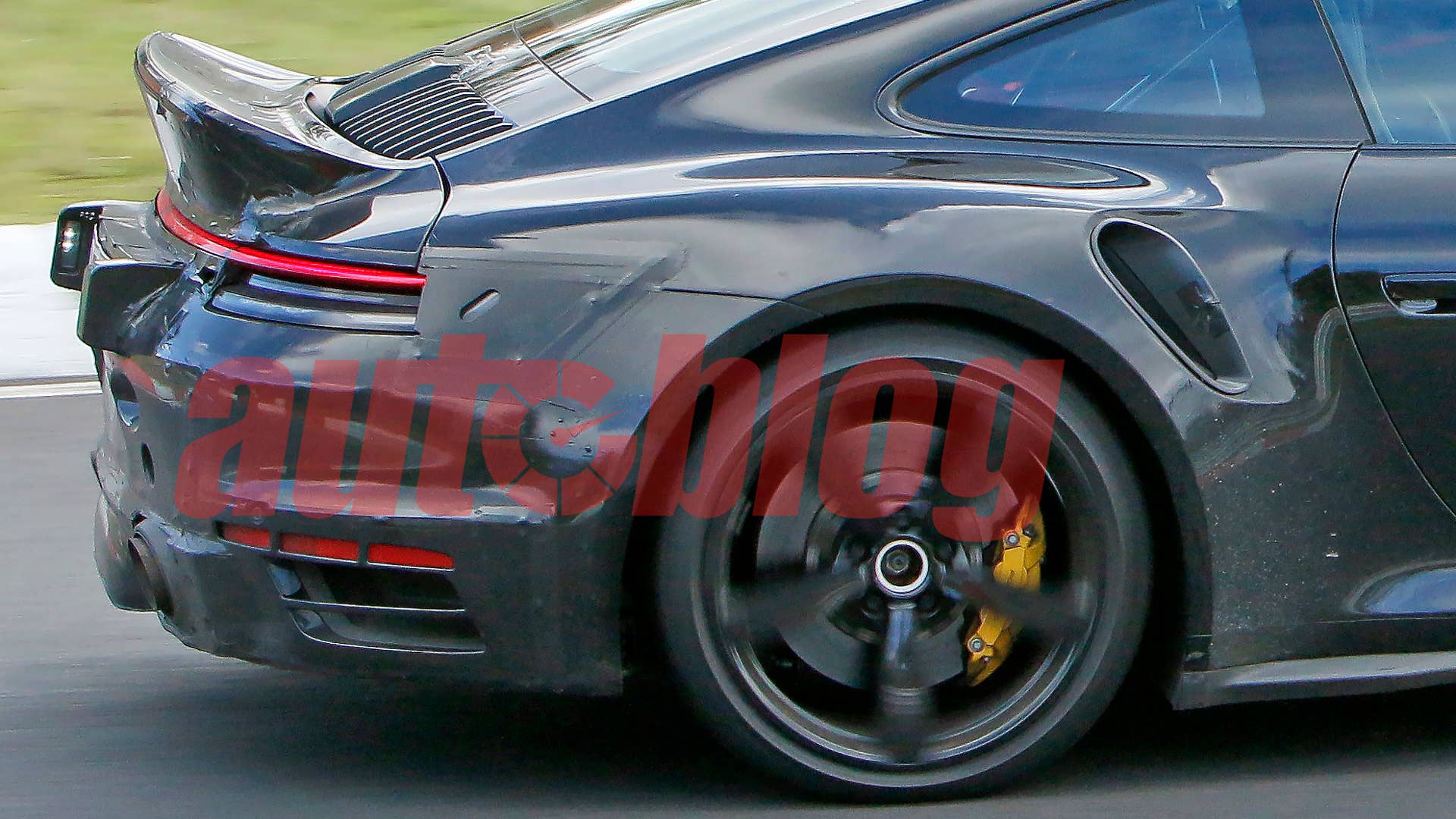 Spy photos show Porsche 911 Turbo ducktail prototype at the 'ring