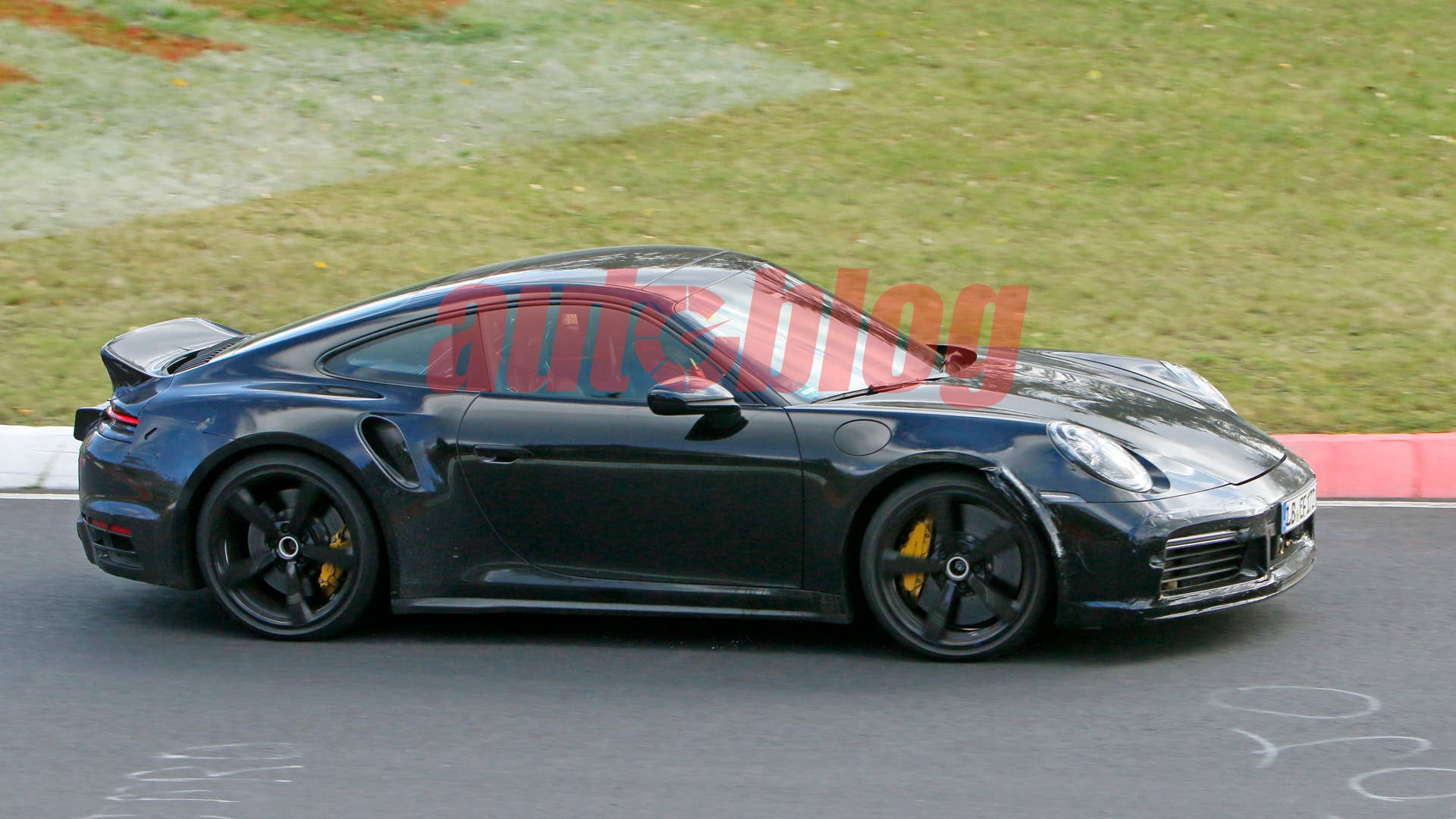 Spy photos show Porsche 911 Turbo ducktail prototype at the 'ring ...