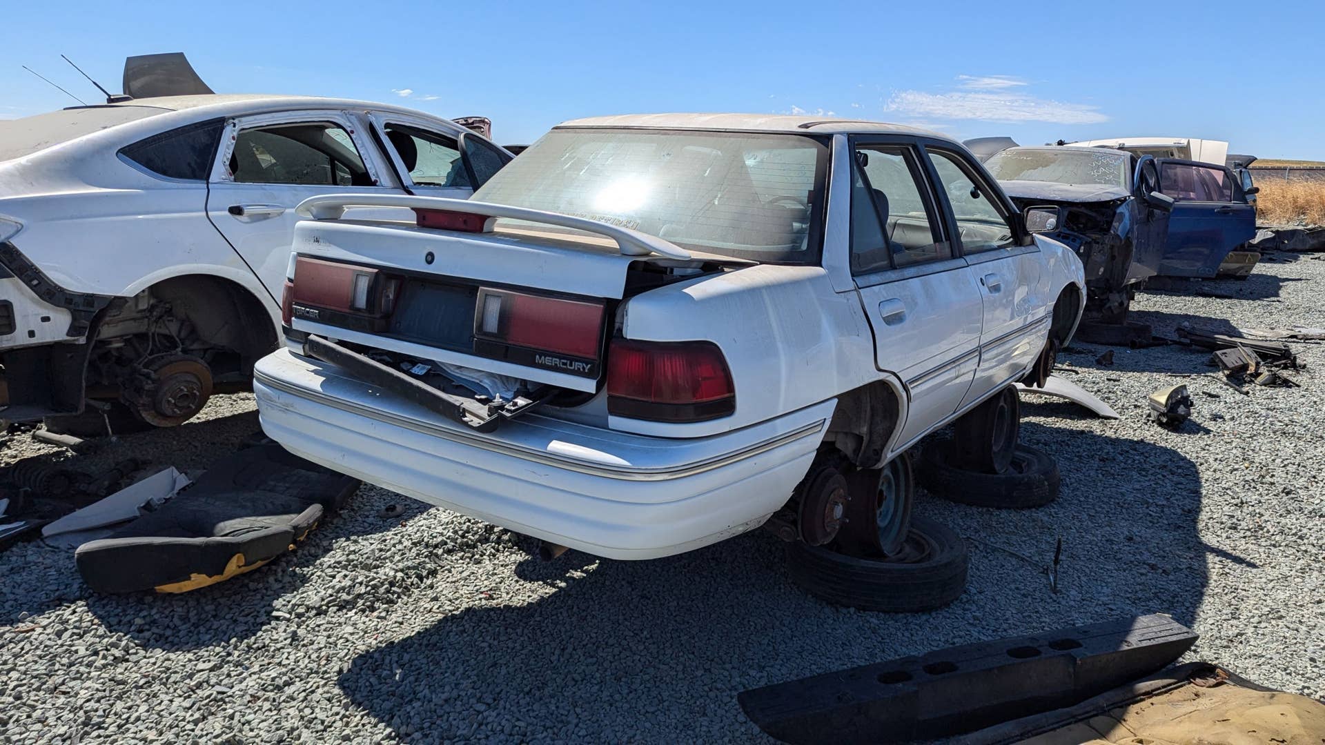 Junkyard Gem: 1995 Mercury Tracer sedan with 319k miles - Autoblog