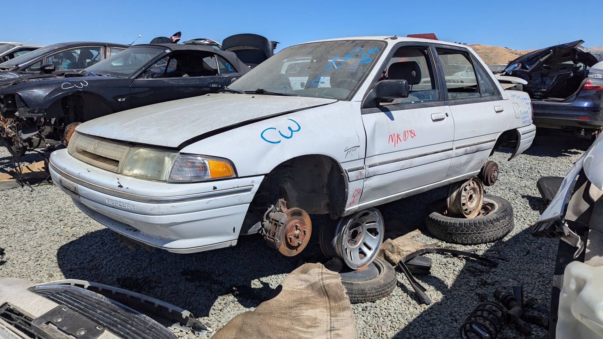 Junkyard Gem: 1995 Mercury Tracer sedan with 319k miles - Autoblog