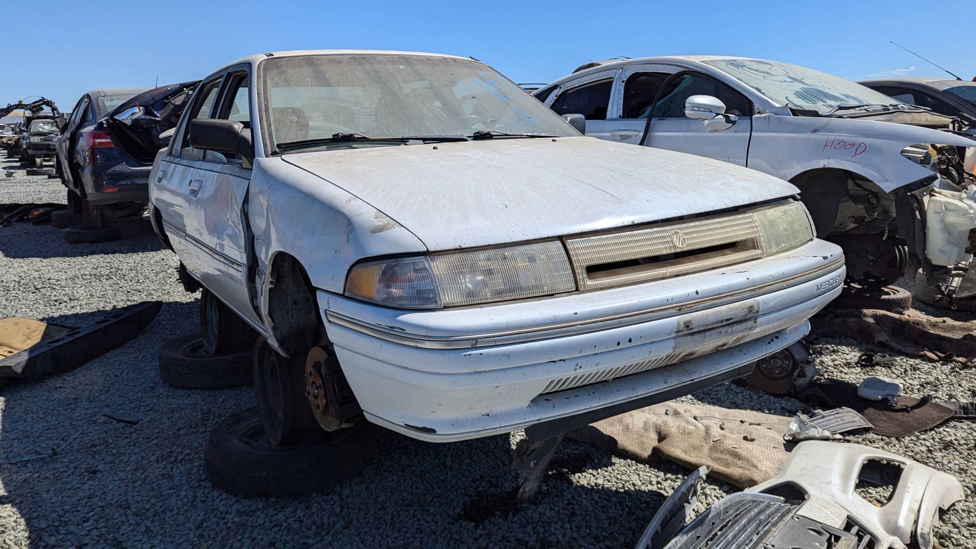 Junkyard Gem: 1995 Mercury Tracer sedan with 319k miles - Autoblog