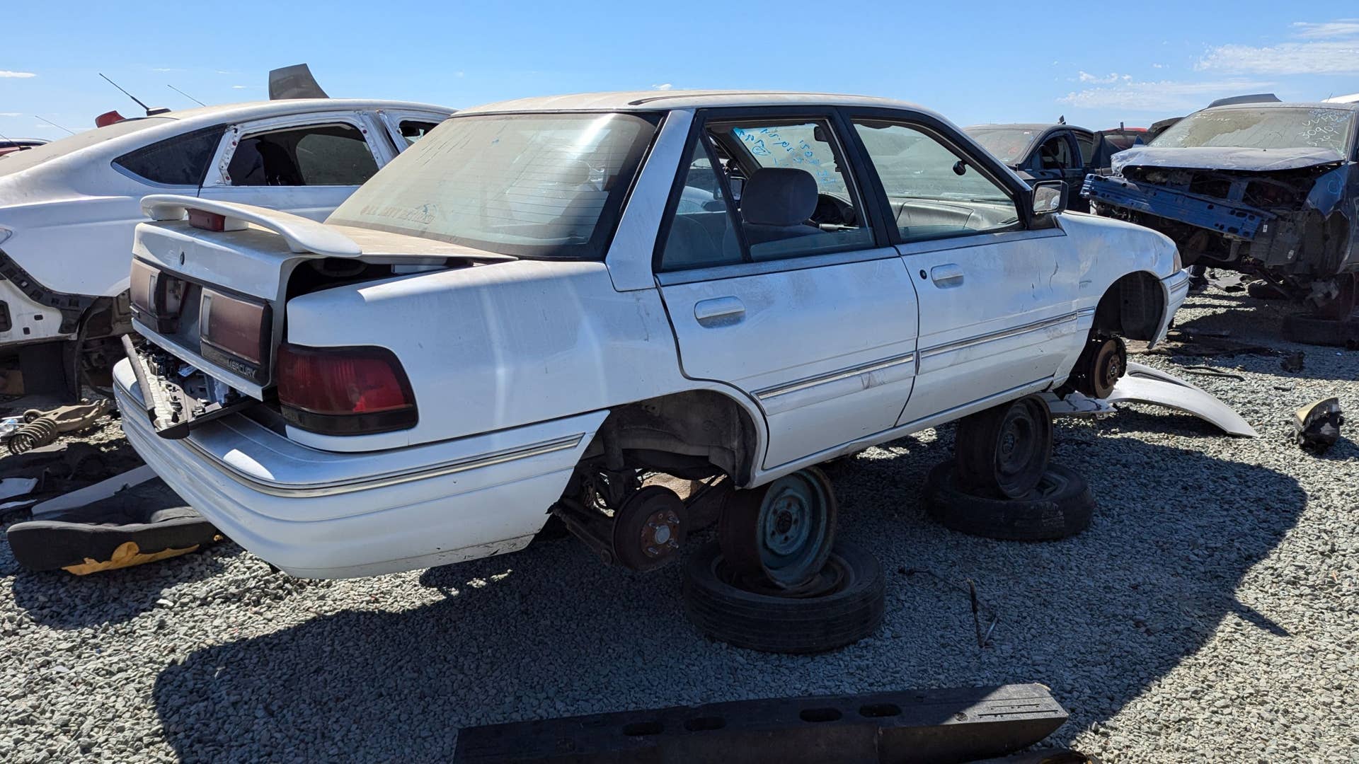 Junkyard Gem: 1995 Mercury Tracer sedan with 319k miles - Autoblog