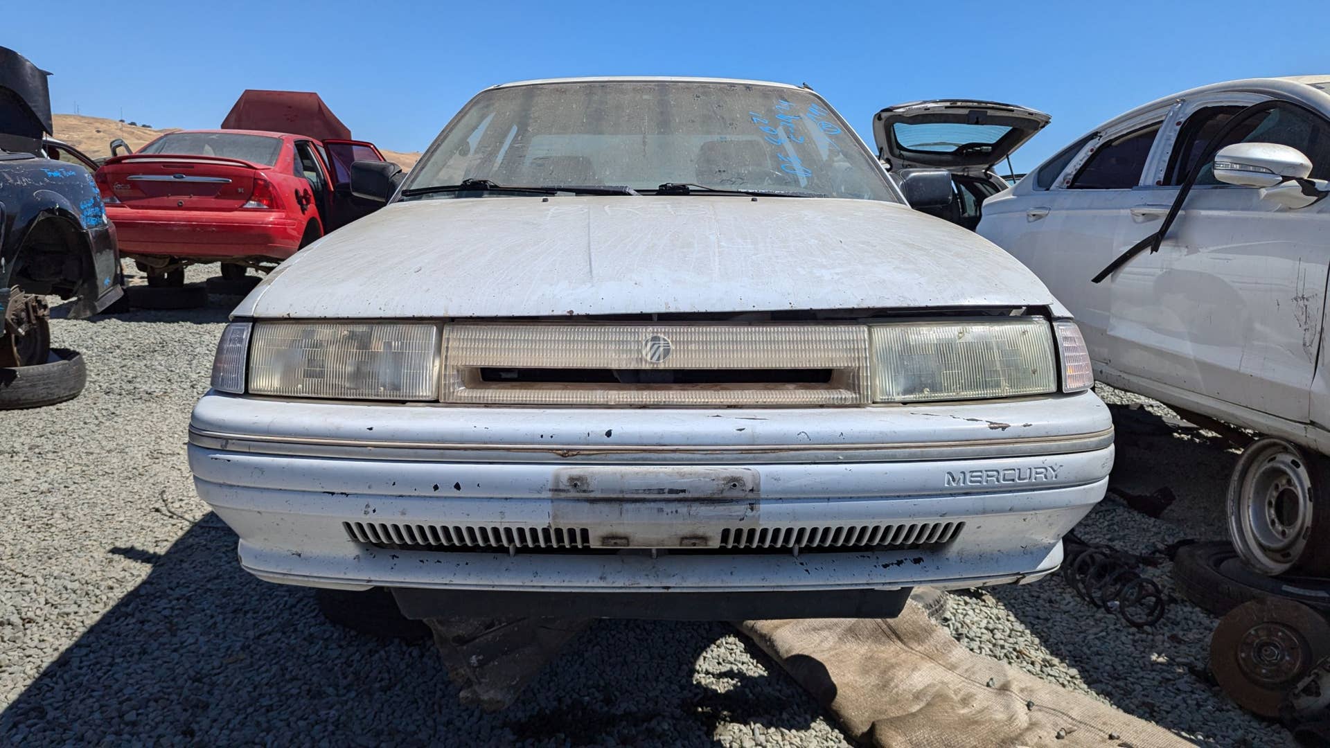 Junkyard Gem: 1995 Mercury Tracer sedan with 319k miles - Autoblog