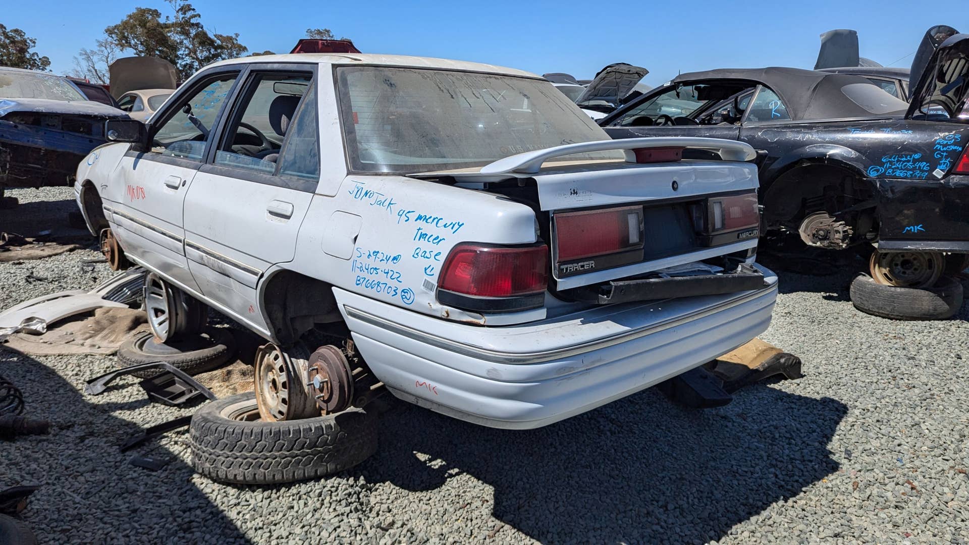 Junkyard Gem: 1995 Mercury Tracer sedan with 319k miles - Autoblog