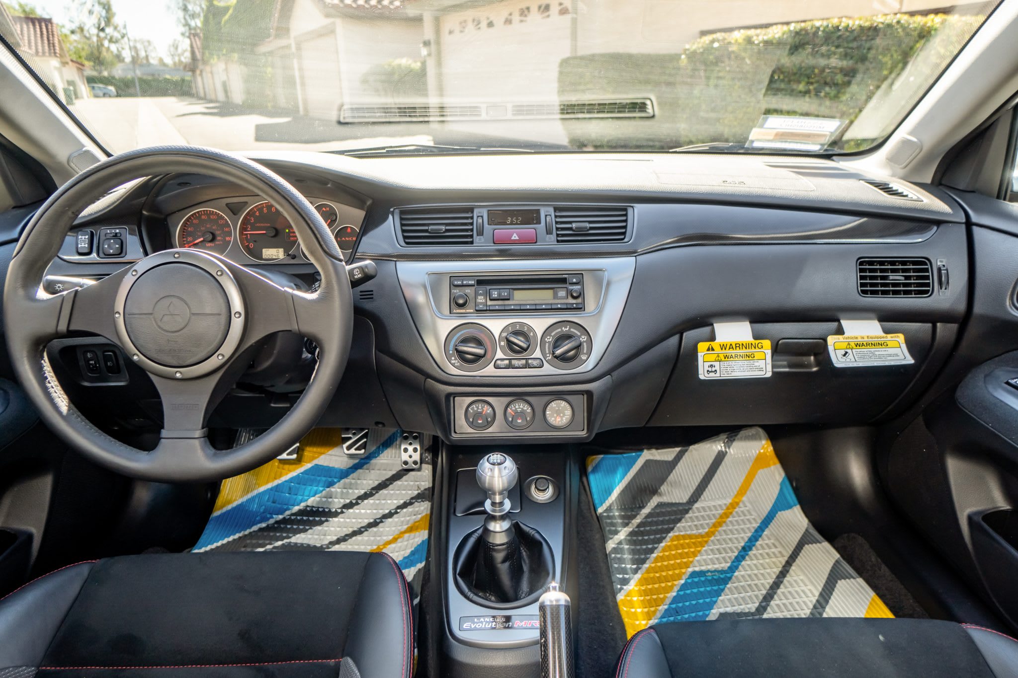 2006 Mitsubishi Lancer Evo with 461 miles sold for $161k on Bring a ...