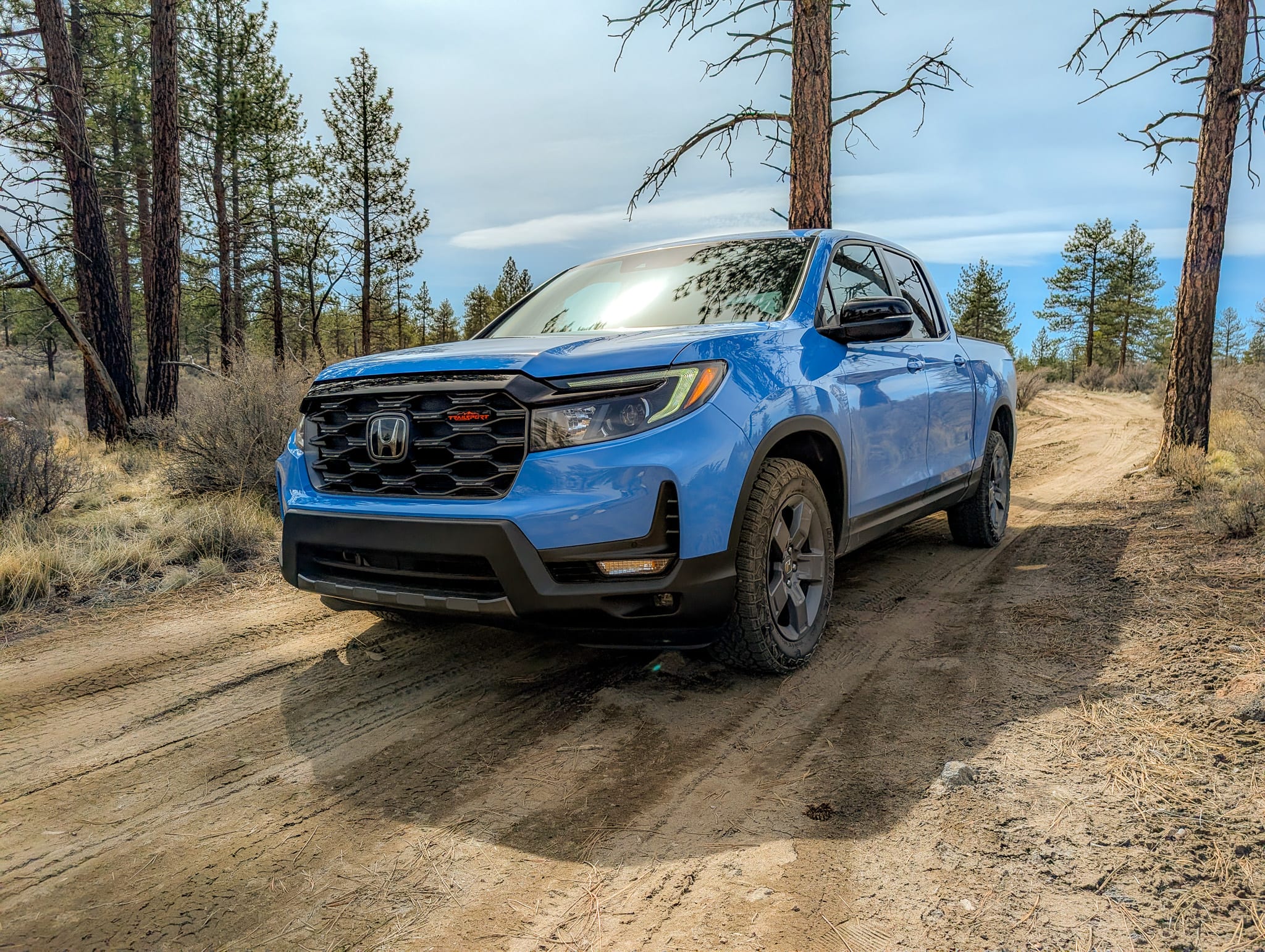 2025 Honda Ridgeline TrailSport vs. 2025 Ford Ranger Lariat 4x4: Which ...