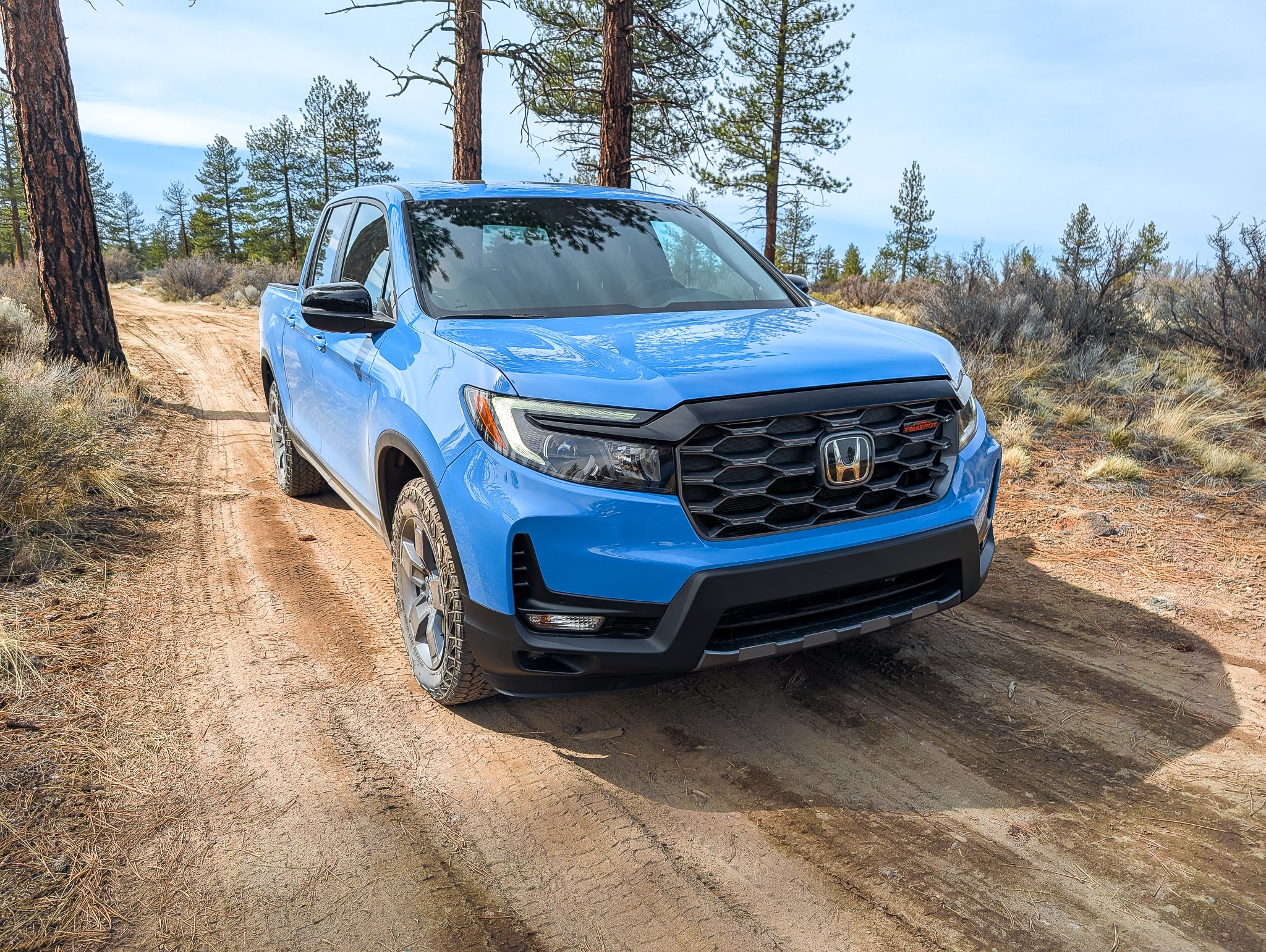 2025 Honda Ridgeline TrailSport vs. 2025 Ford Ranger Lariat 4x4: Which ...